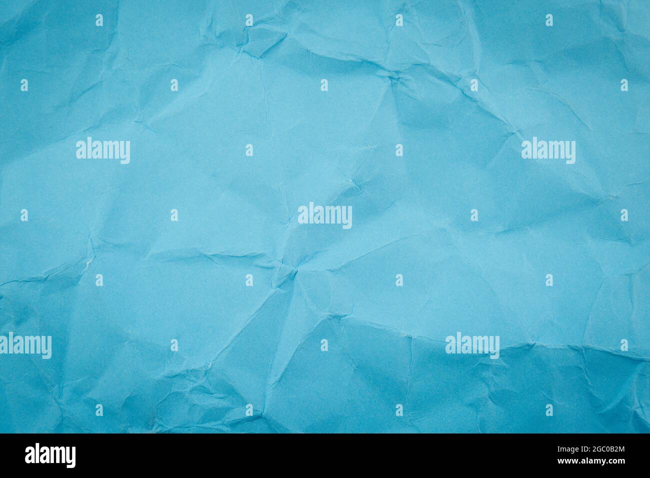 Blue crumpled paper texture background Stock Photo - Alamy