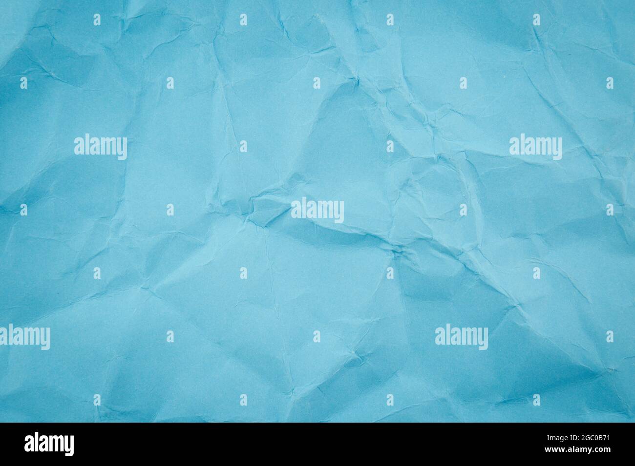 Blue crumpled paper texture background Stock Photo - Alamy