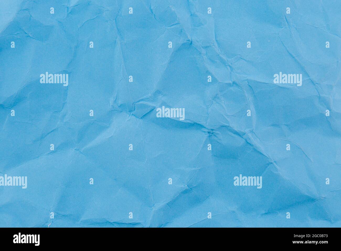 Blue crumpled paper texture background Stock Photo - Alamy