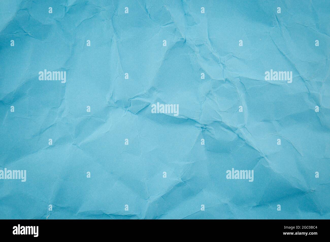 Blue crumpled paper texture background Stock Photo - Alamy