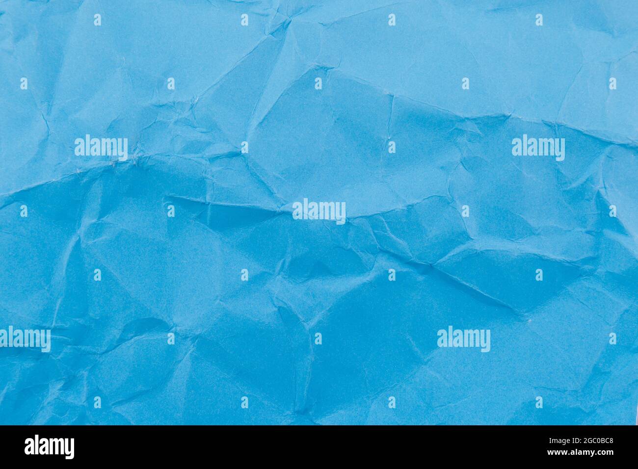 Blue crumpled paper texture background Stock Photo - Alamy
