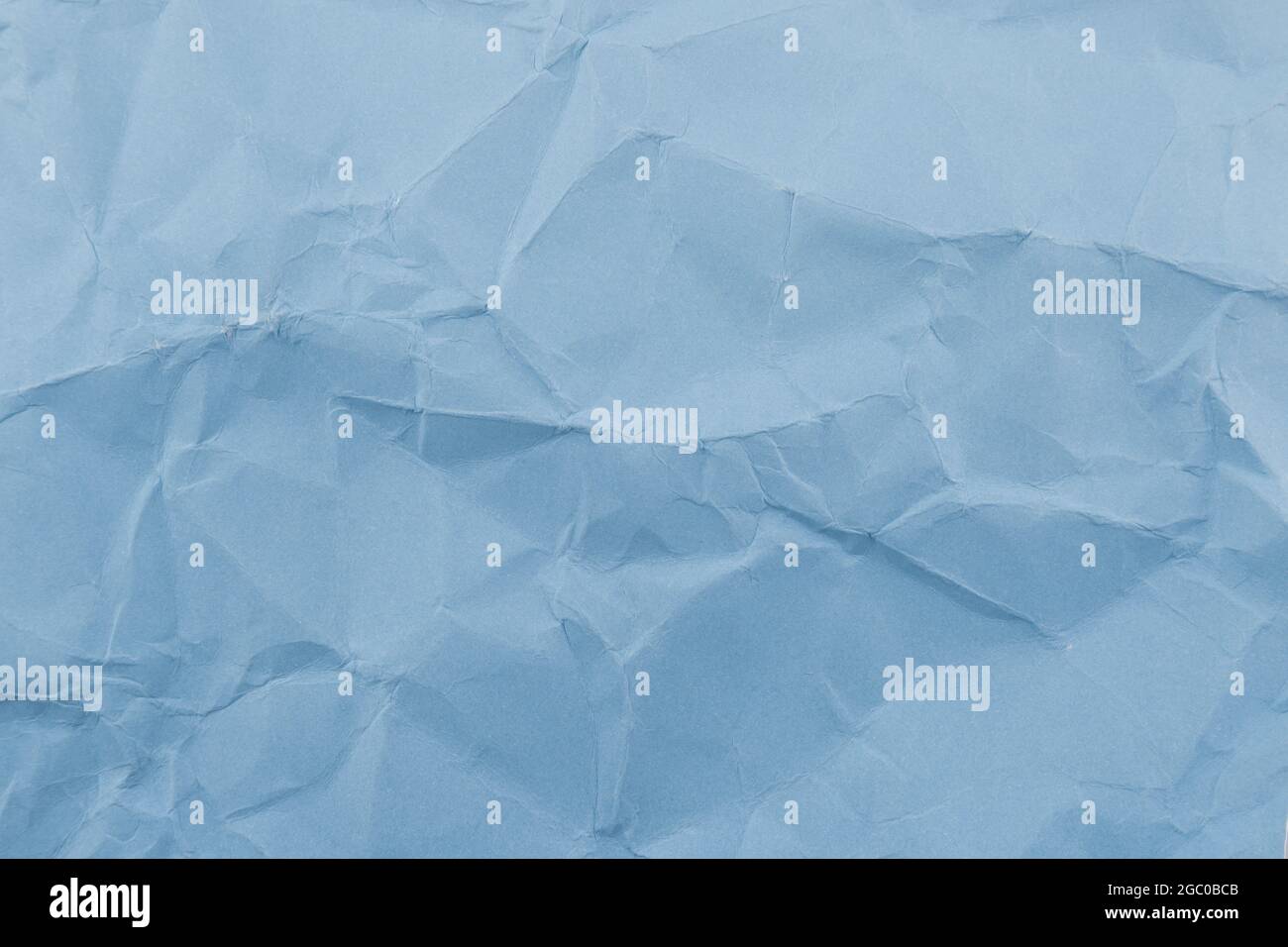Blue crumpled paper texture background Stock Photo - Alamy