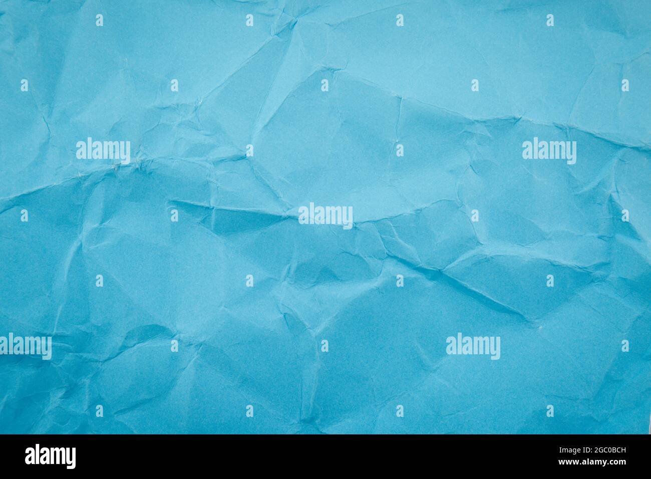 Blue crumpled paper texture background Stock Photo - Alamy