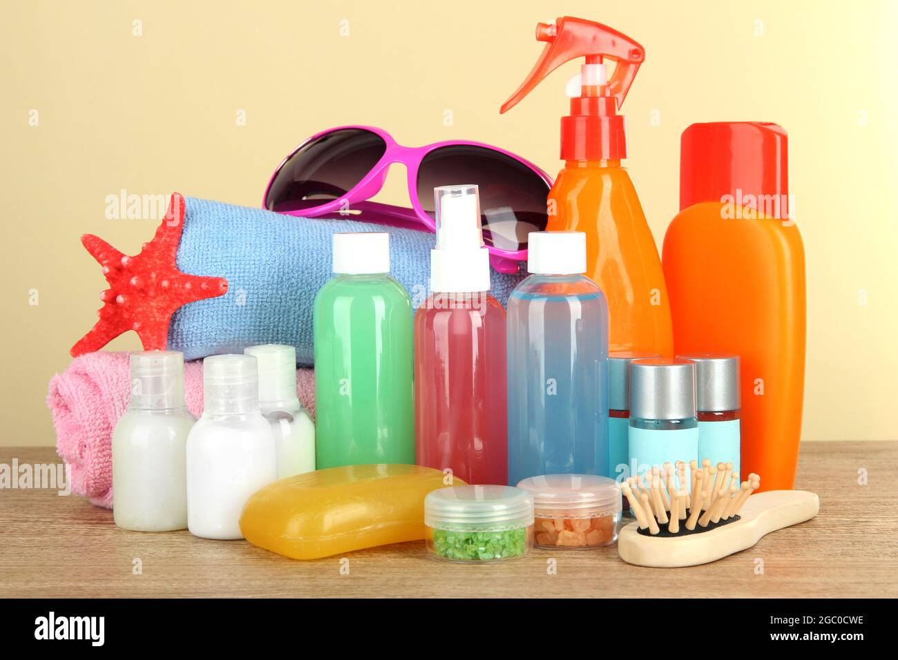 Hotel amenities kit on table on beige background Stock Photo - Alamy