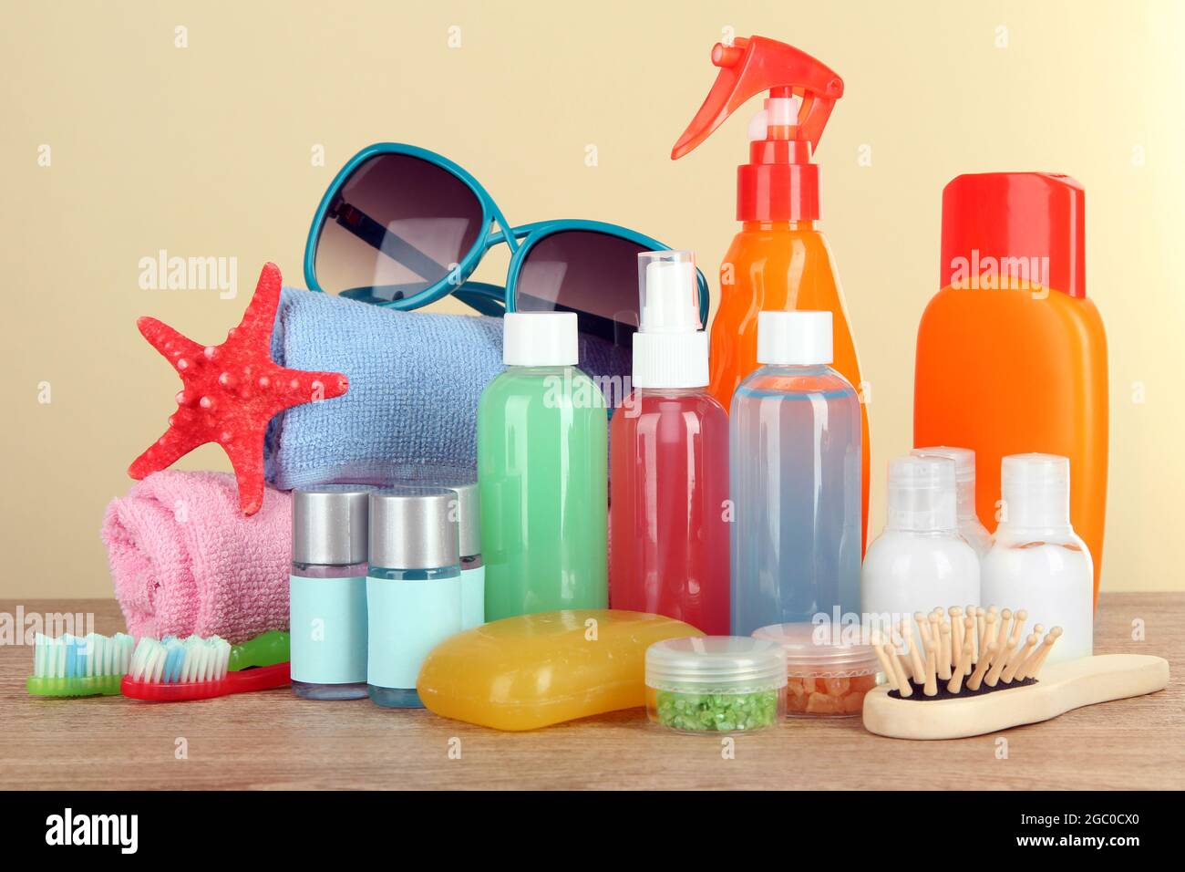 Hotel amenities kit on table on beige background Stock Photo - Alamy