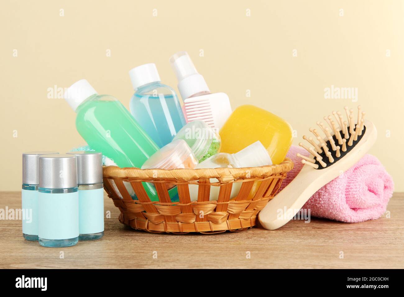 Hotel amenities kit on table on beige background Stock Photo - Alamy