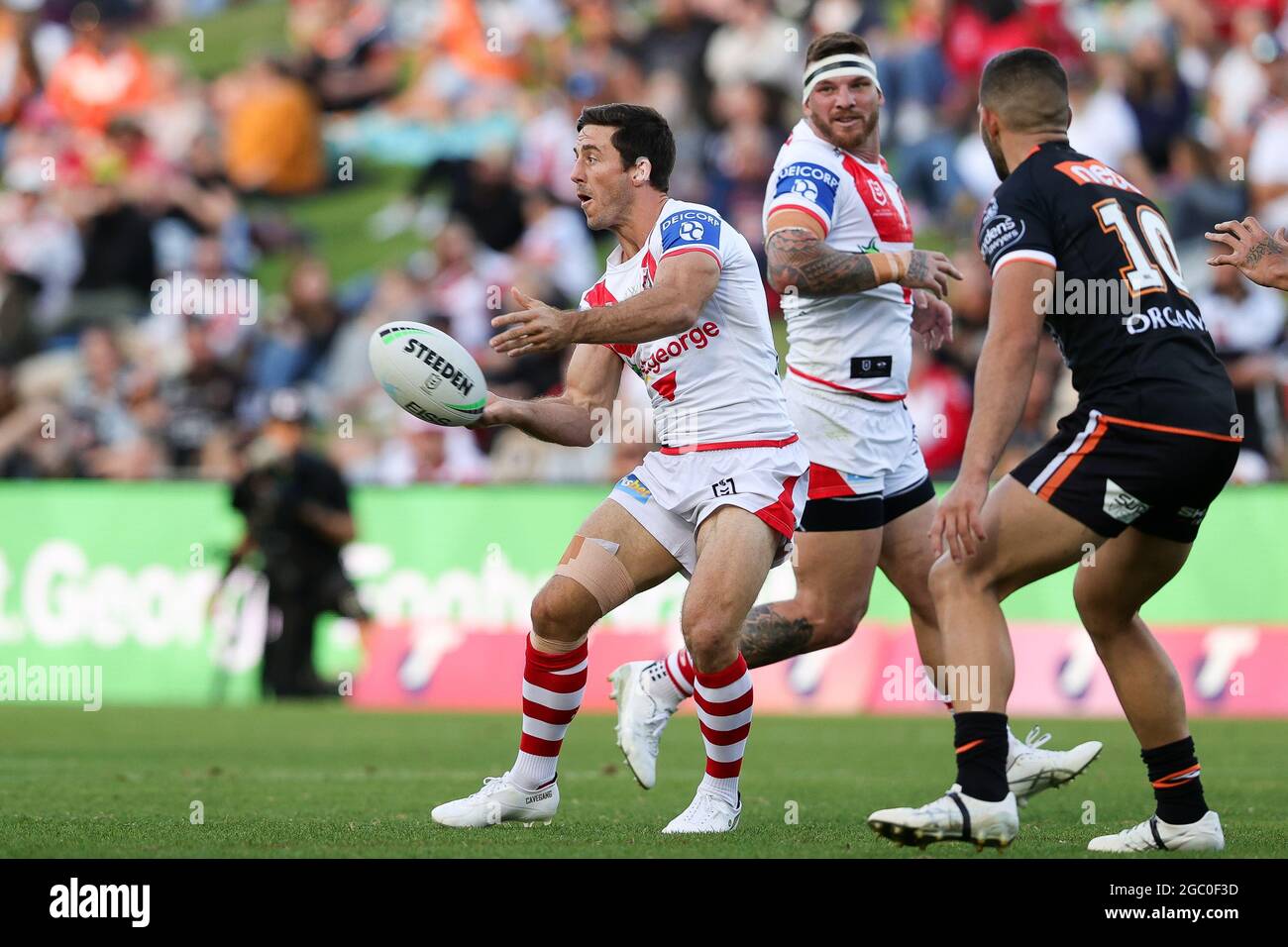 WOLLONGONG, AUSTRALIA - MAY 02: Ben Hunt of the Dragons passes the ball ...