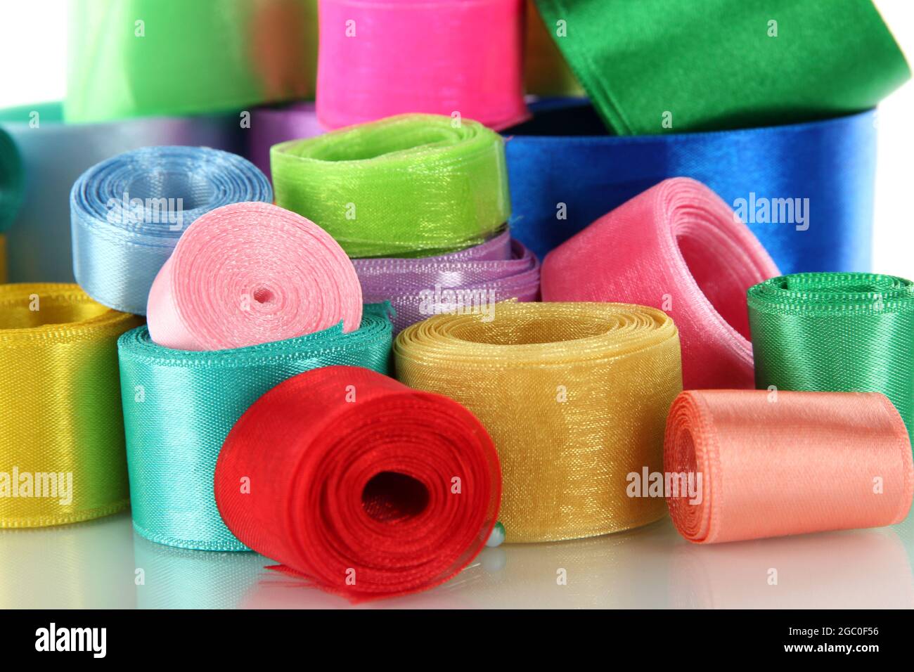 Many bright ribbons of different sizes isolated on white Stock Photo ...