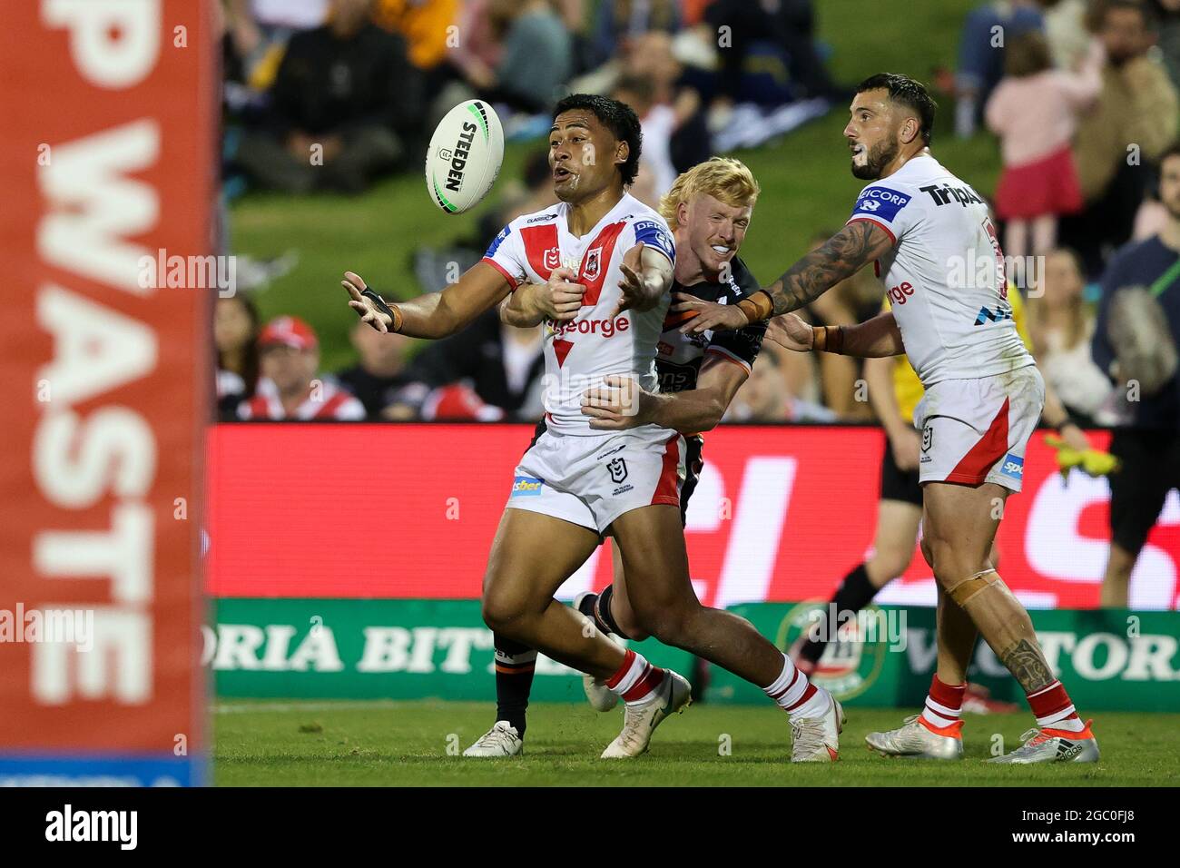 WOLLONGONG, AUSTRALIA - MAY 02: Max Feagai of the Dragons challenged by ...