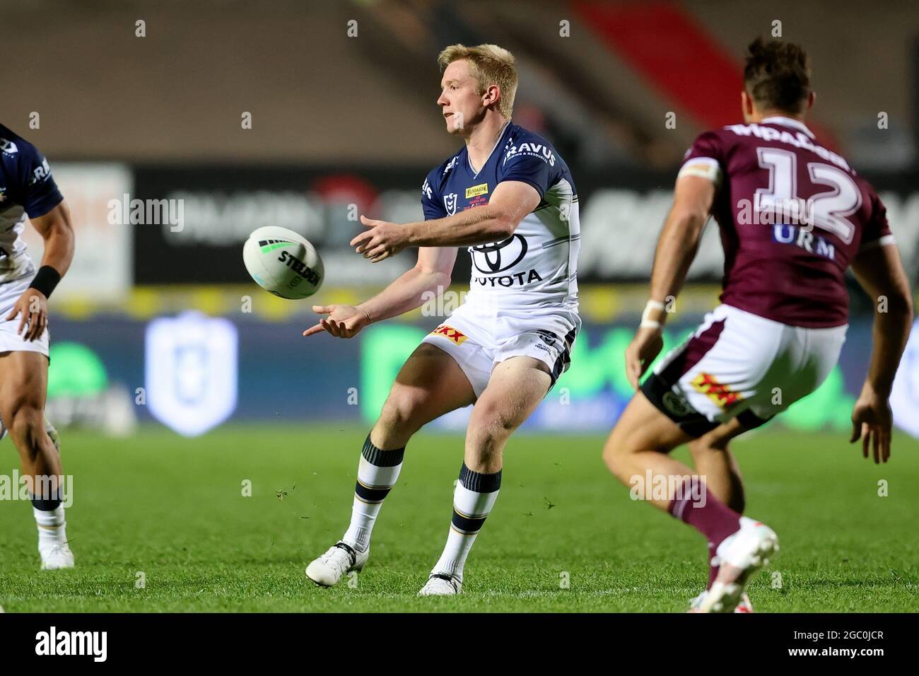 SYDNEY, AUSTRALIA - JUNE 11: Tom Dearden of the Cowboys passes the ball ...