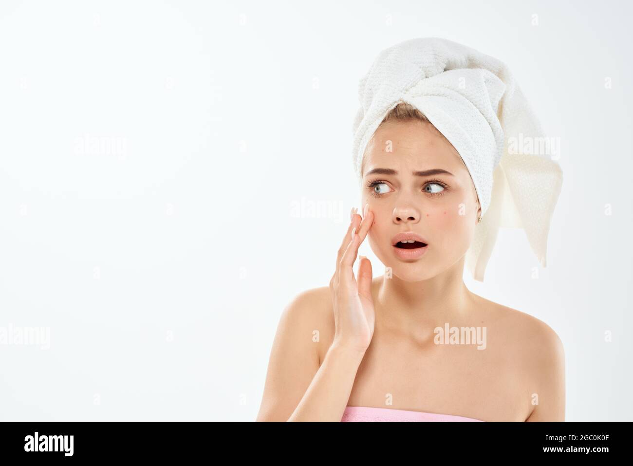 woman with a towel on her head skin care face dermatology hygiene Stock ...