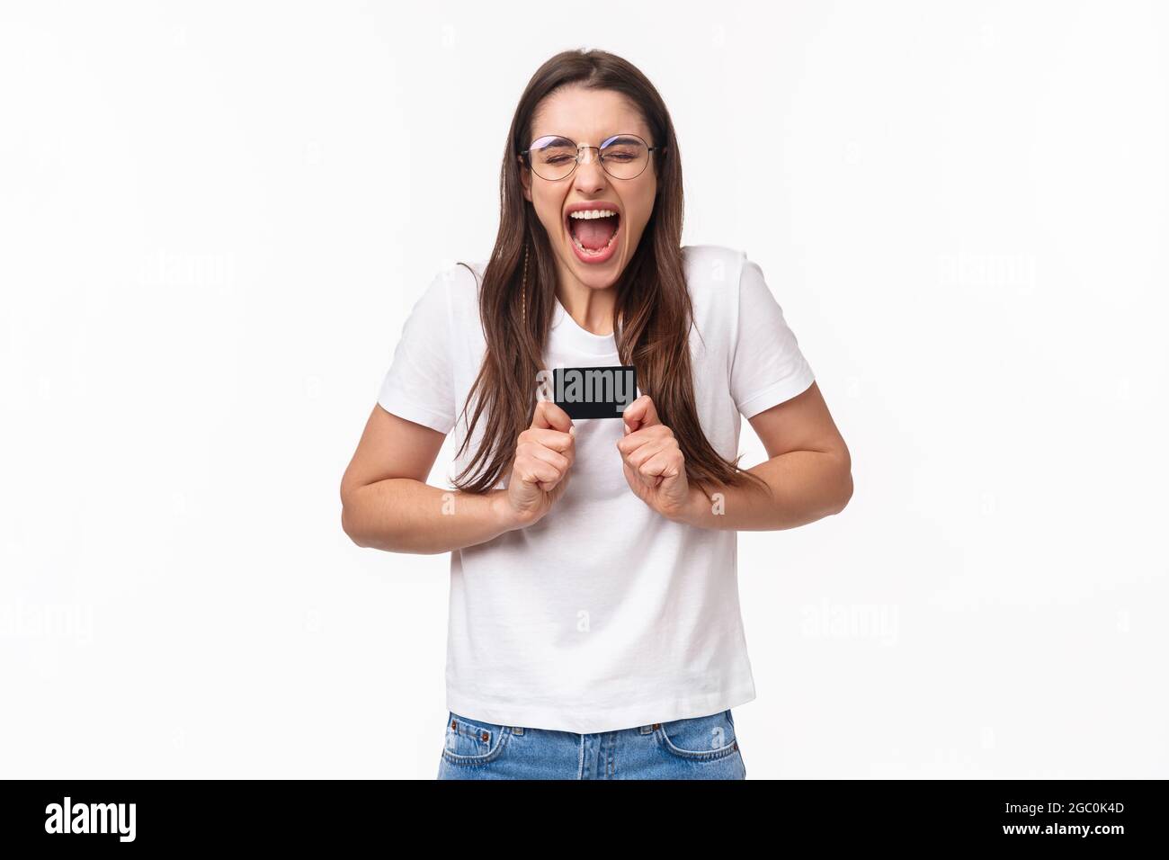 Portrait of excited female shopaholic cant wait to waste all money on ...
