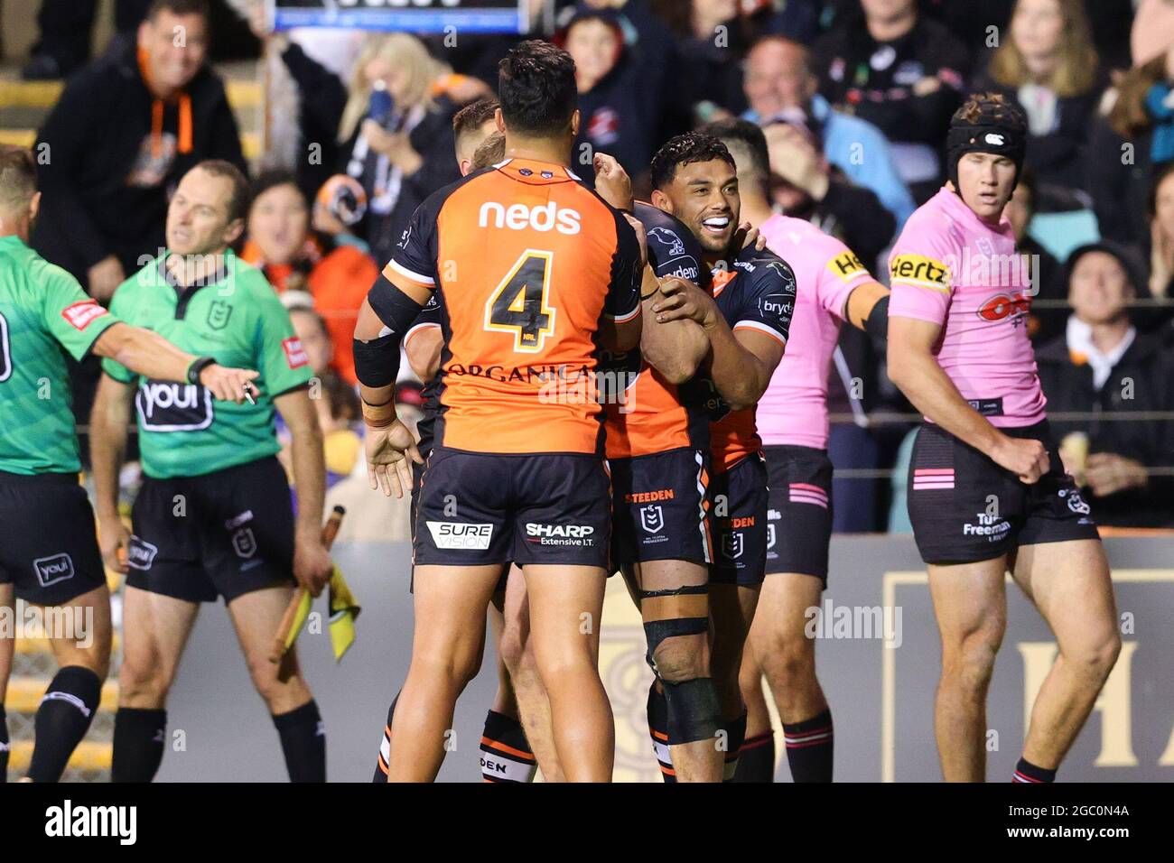 Jacob Liddle of the Tigers scores a try and celebrates Credit: Pete ...