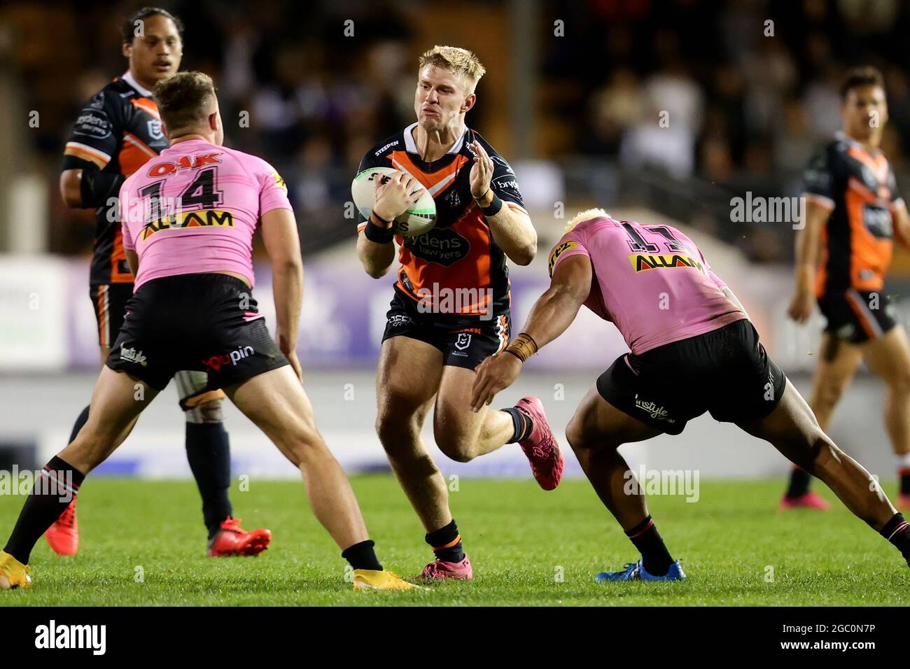 Luke Garner of the Tigers runs the ball Credit: Pete Dovgan/Speed Media ...