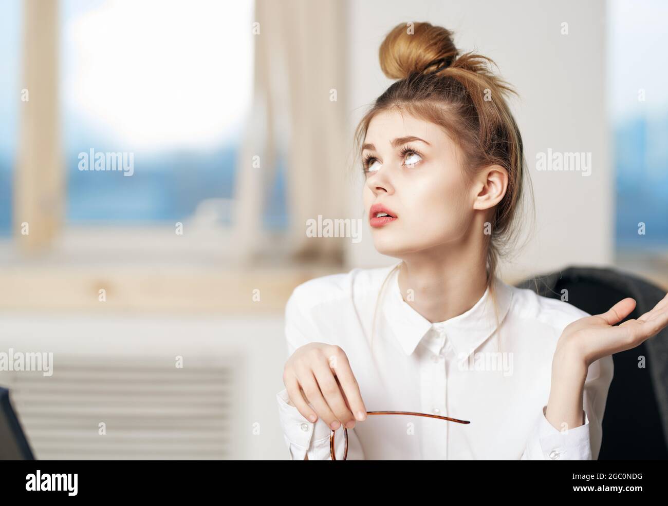 emotional woman secretary work desk manager office Stock Photo - Alamy
