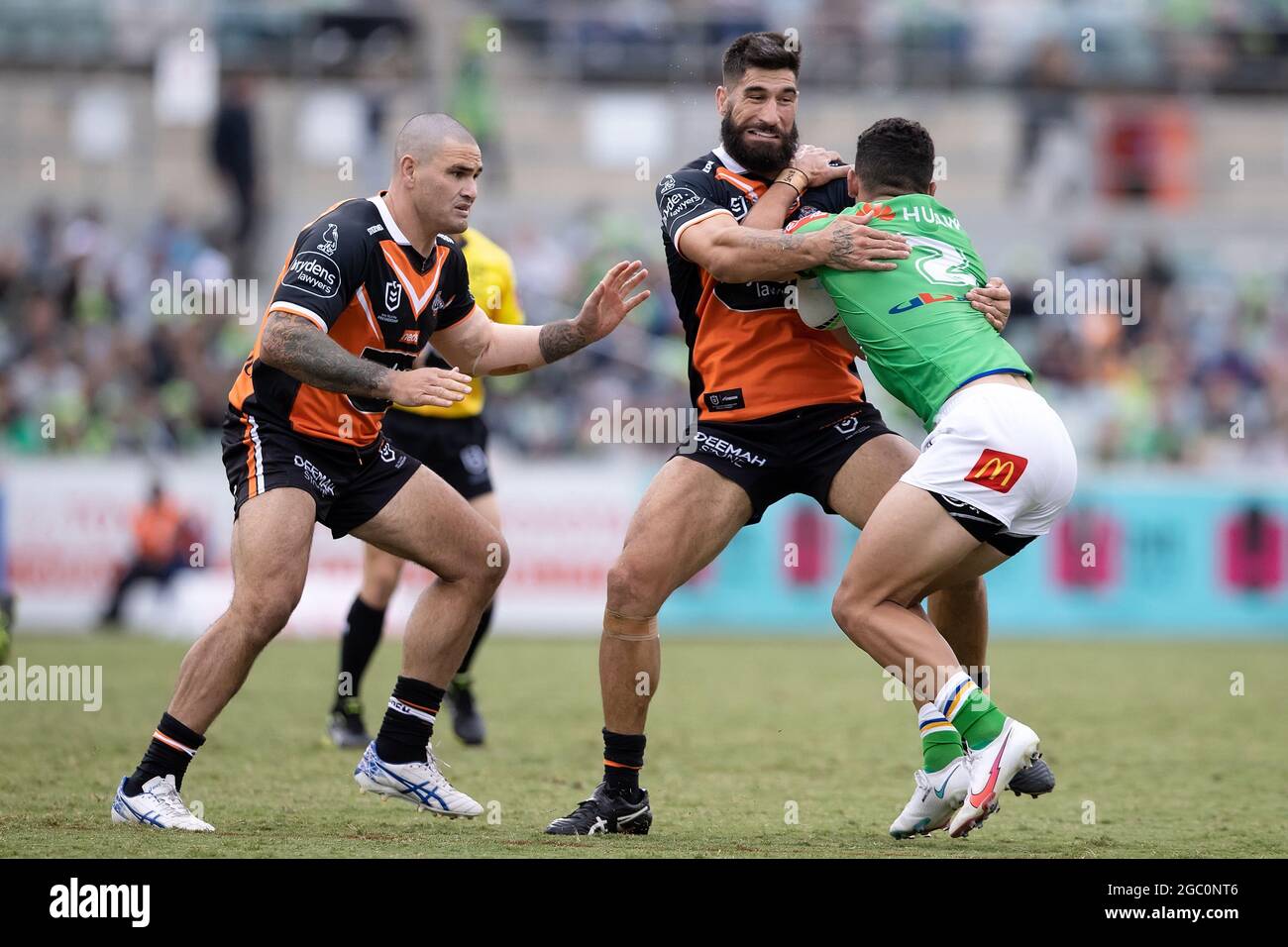 CANBERRA, AUSTRALIA - MARCH 14: James Tamou of the Tigers tackles ...