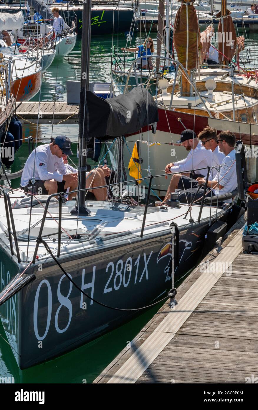 Racing crews at cowes yacht haven hi-res stock photography and images ...
