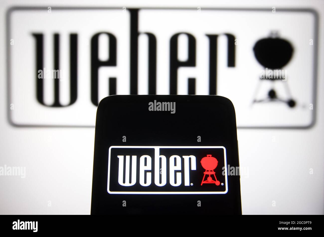 In this photo illustration a Weber logo is seen on a smartphone screen ...