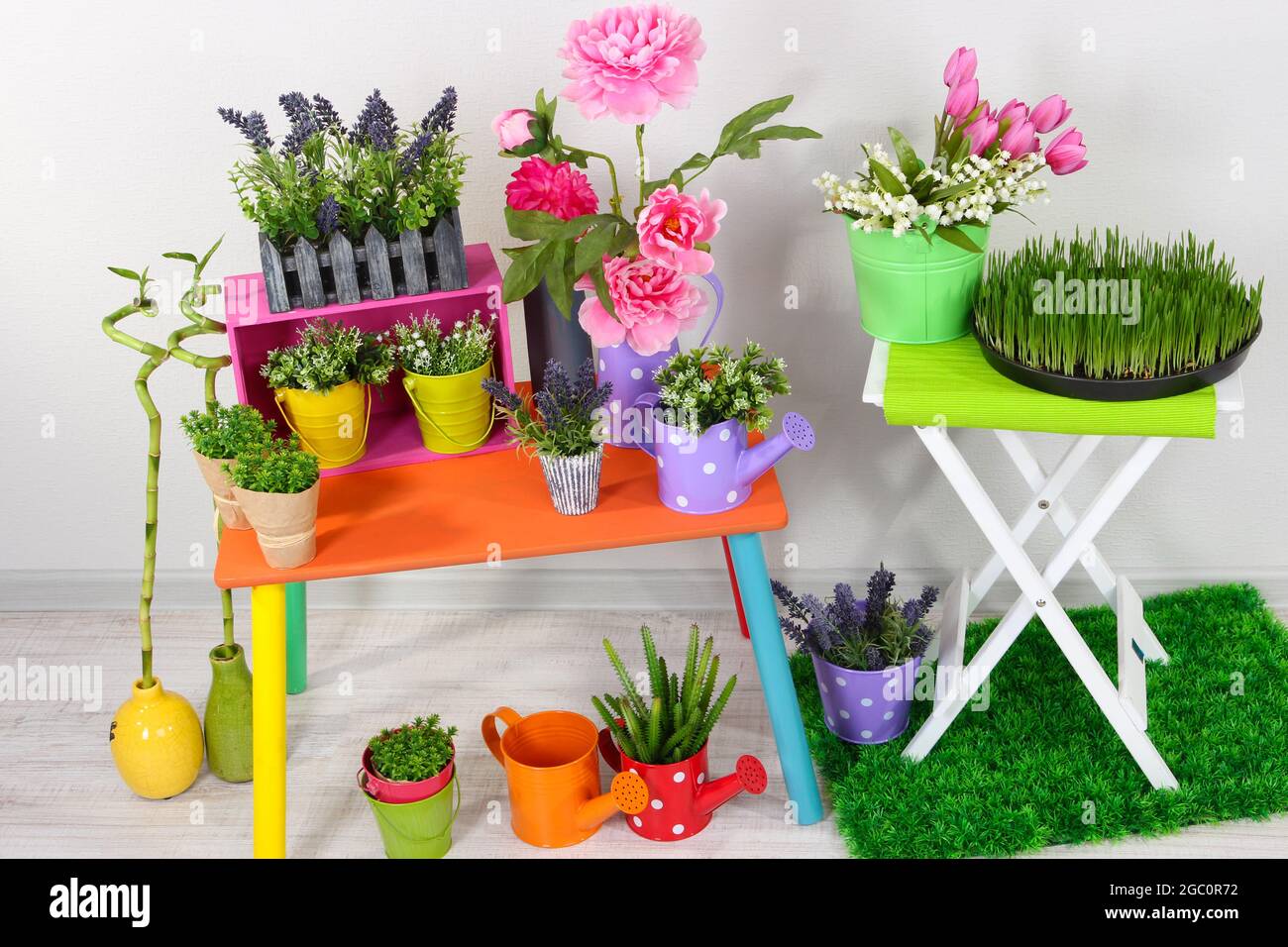 Beautiful colorful shelves with decorative elements standing in room ...