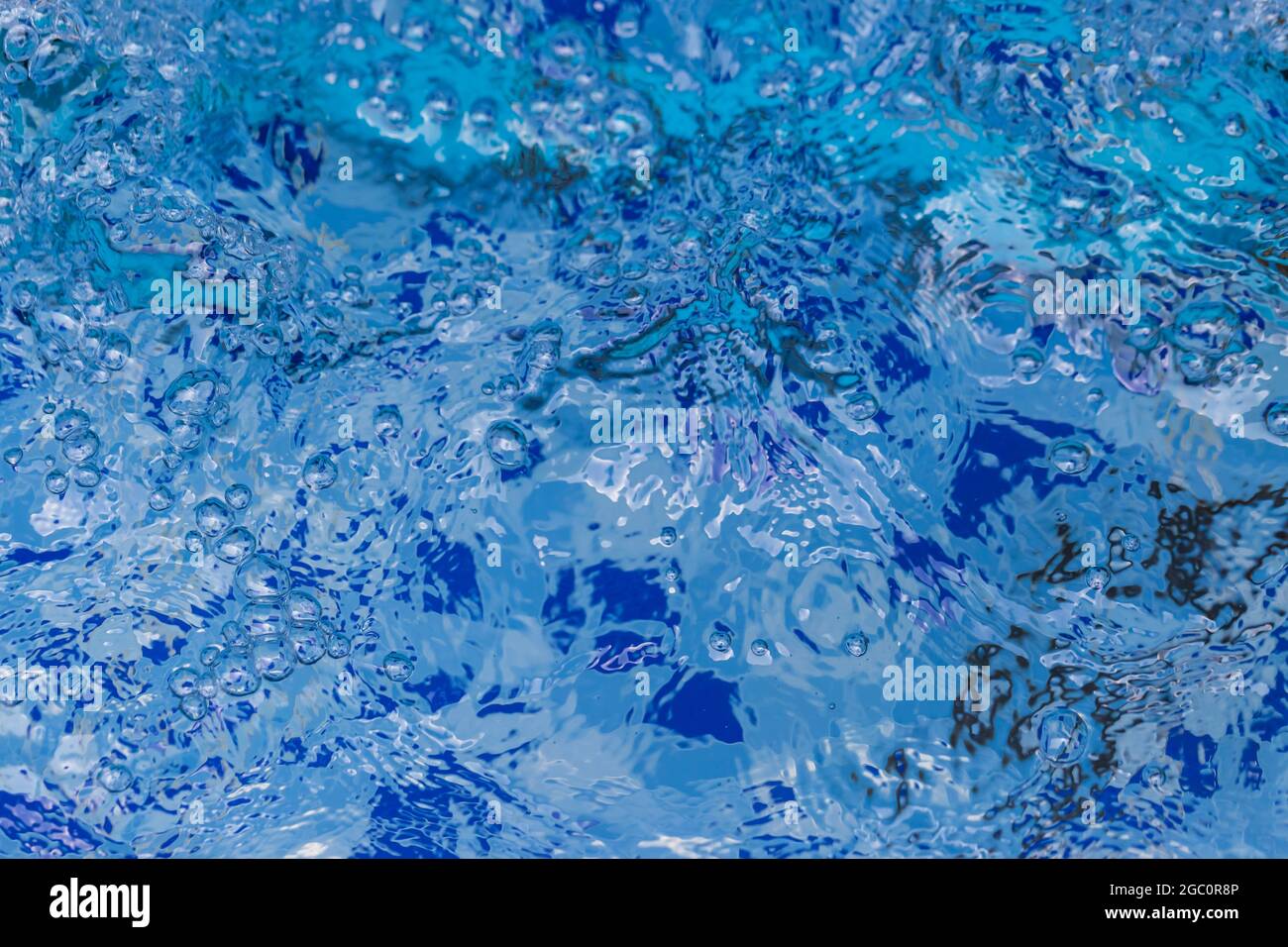 water waves bubbles on blue background Stock Photo - Alamy