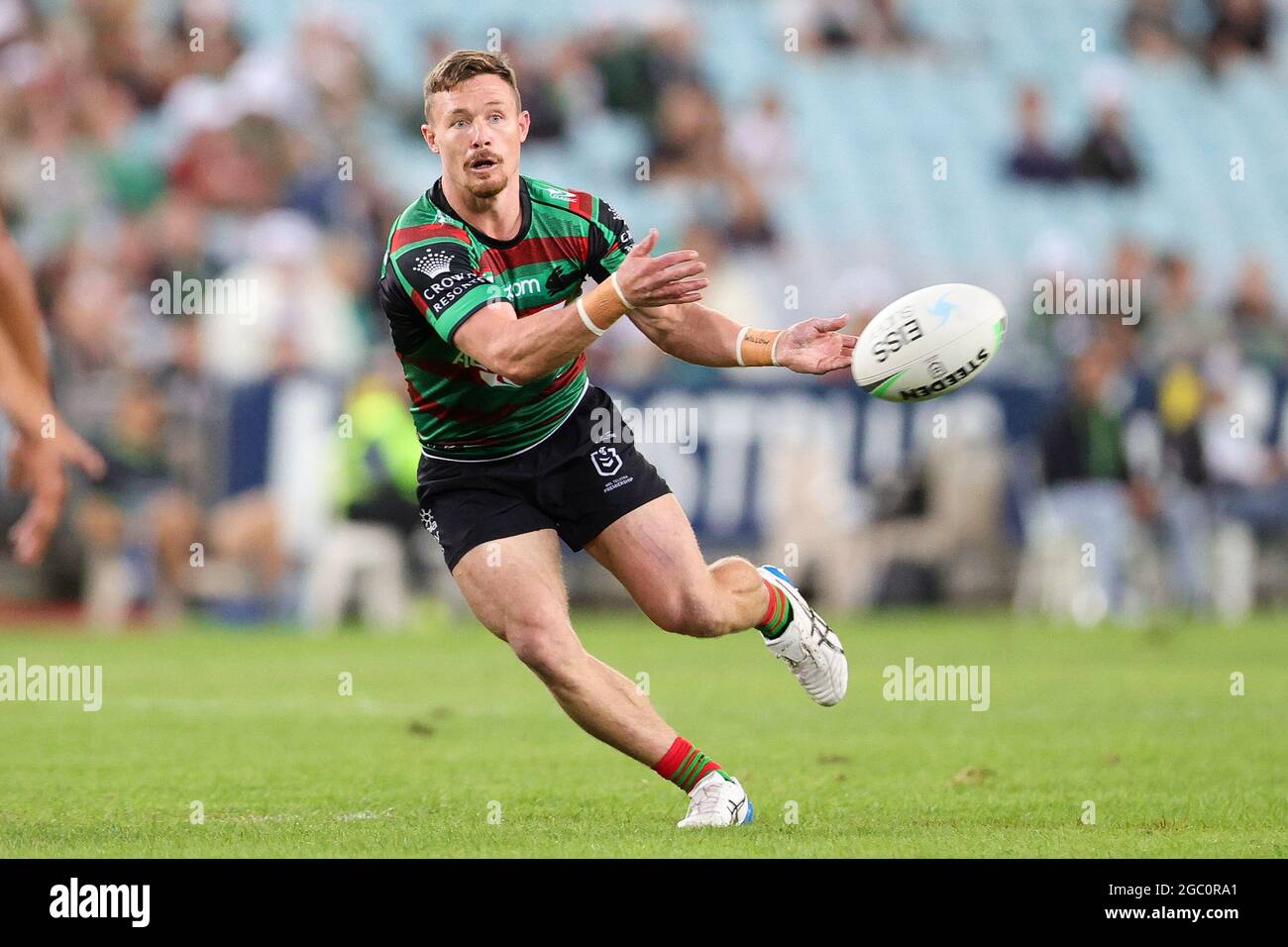SYDNEY, AUSTRALIA - MARCH 26: Damien Cook of the Rabbitohs passes ...