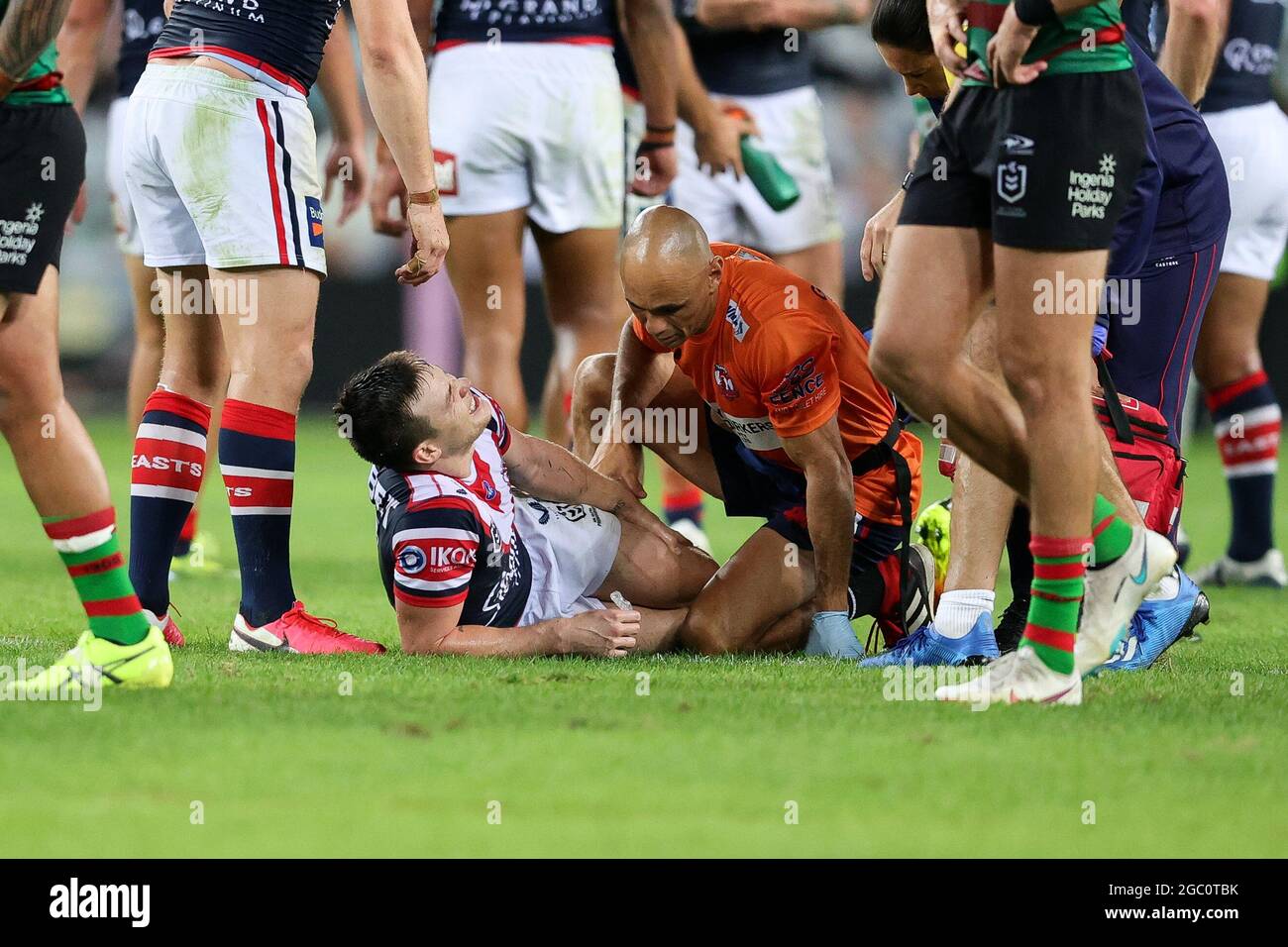 SYDNEY, AUSTRALIA - MARCH 26: Luke Keary of the Roosters is treated for ...