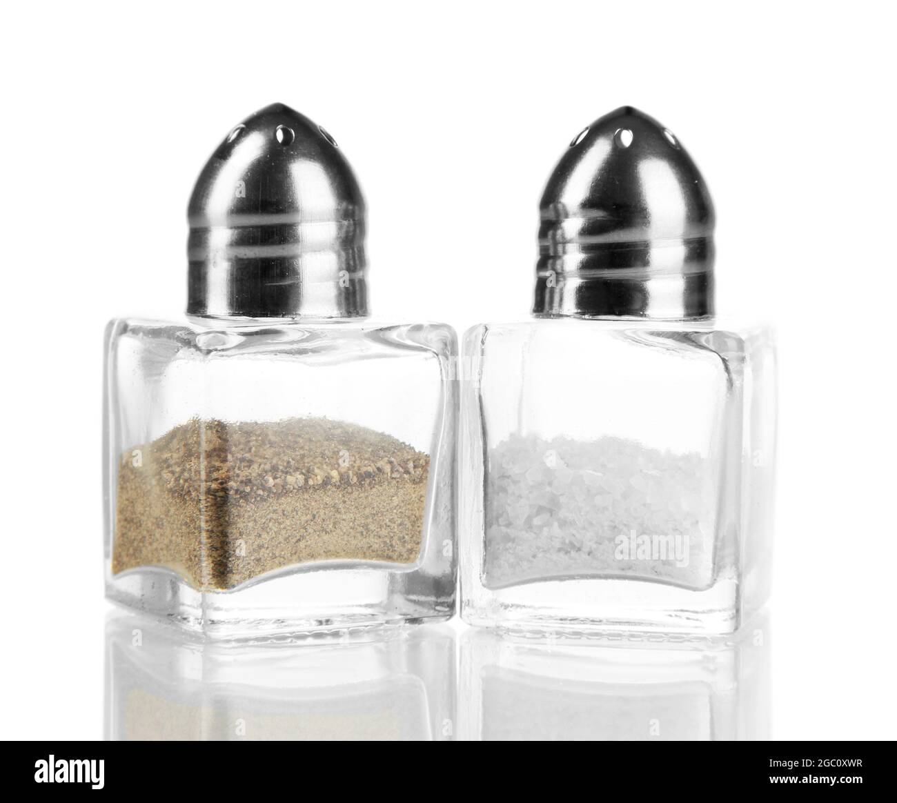 Containers for salt and pepper isolated on white Stock Photo - Alamy
