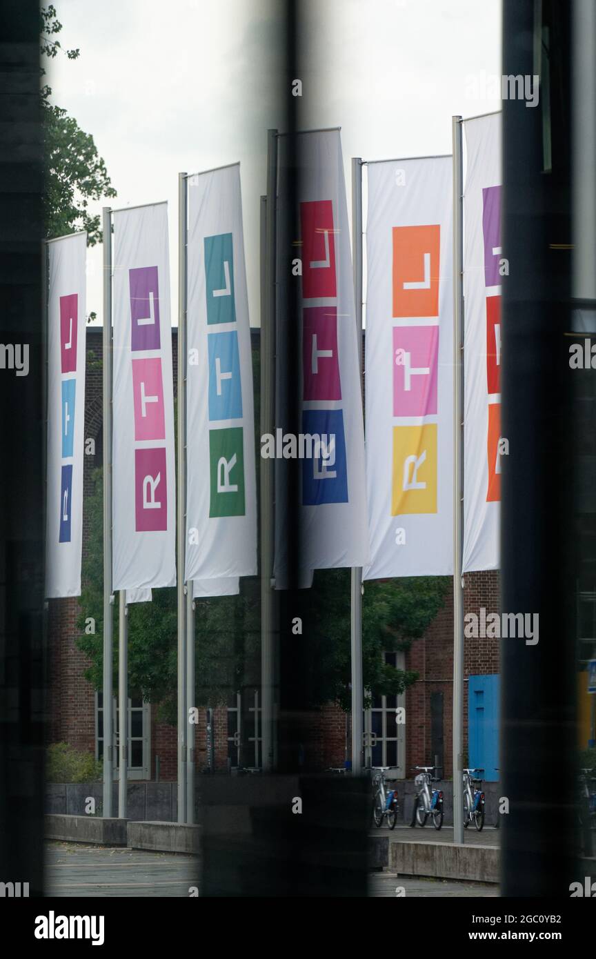 Cologne, Germany. 03rd Aug, 2021. Flags of the TV station RTL stand on ...