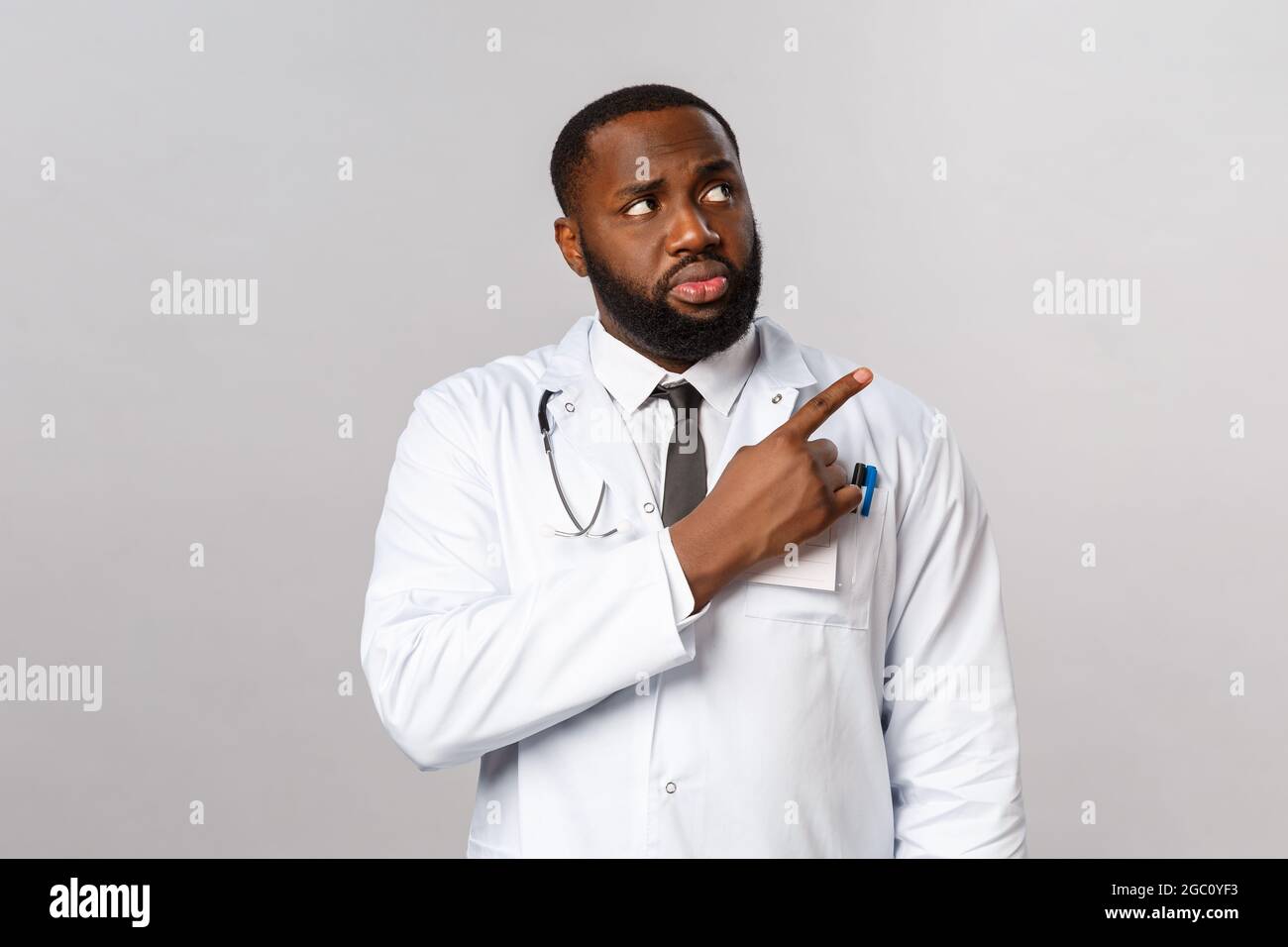 Healthcare, medicine and epidemic concept. Skeptical, hesitant african ...