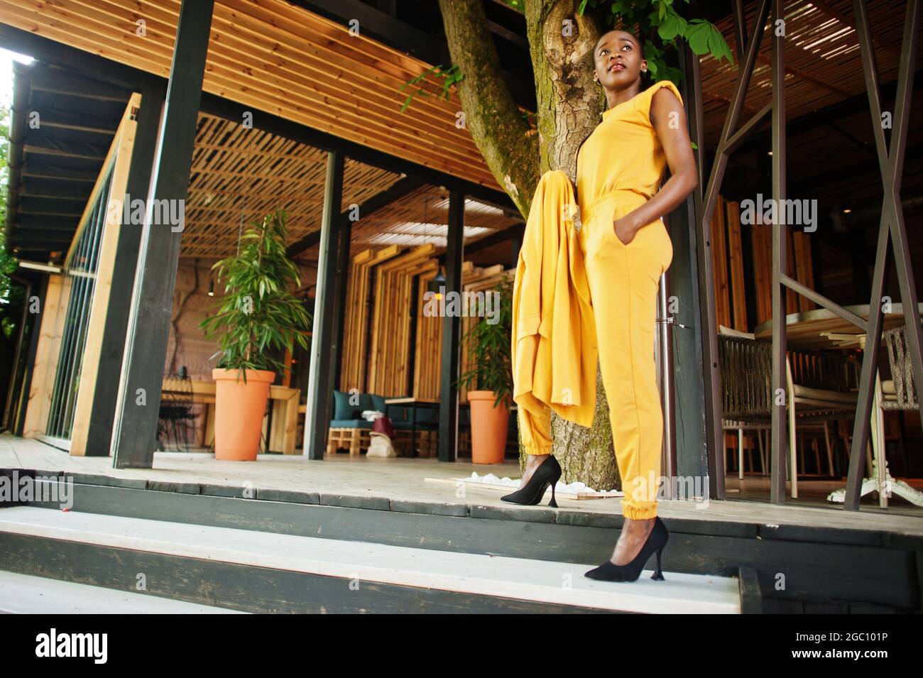 Portrait of nice-looking fashionable attractive lovely content cheerful ...