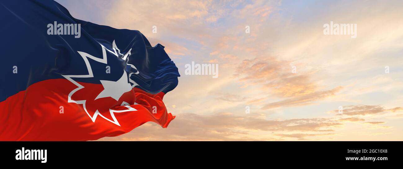 flags of Juneteenth waving in the wind on flagpoles against sky with ...