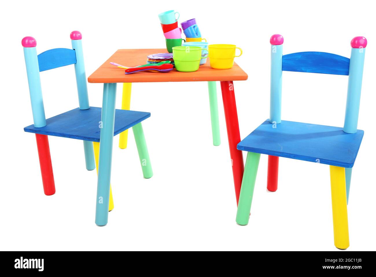Small and colorful table and chairs for little kids isolated on white ...