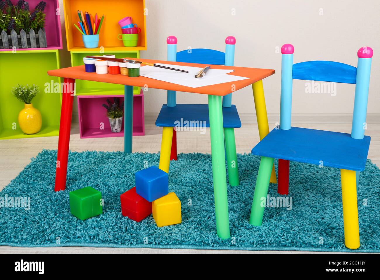 Small and colorful table and chairs for little kids Stock Photo - Alamy