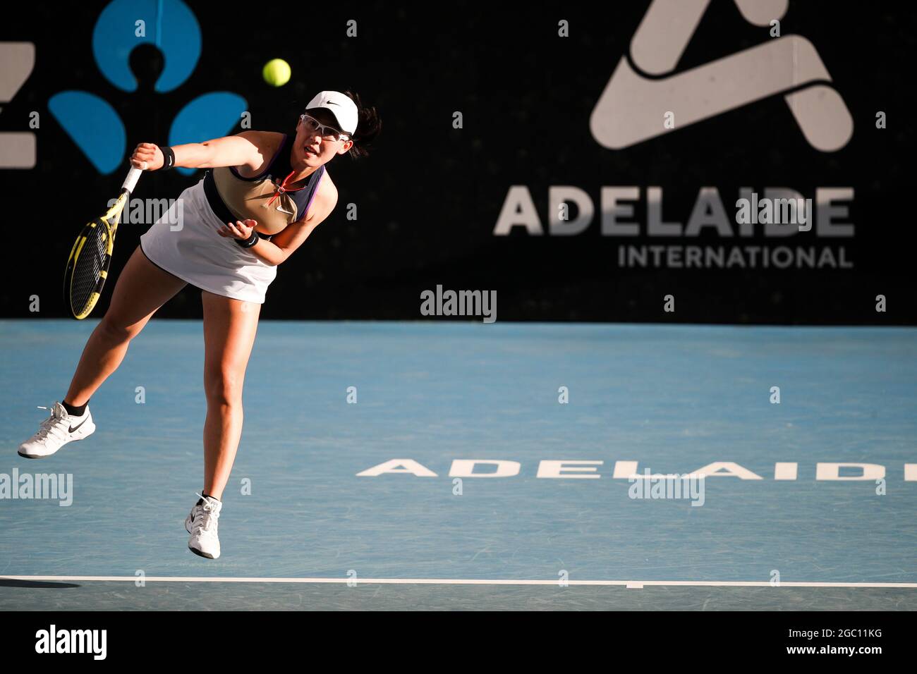 ADELAIDE, AUSTRALIA - FEBRUARY 22: Saisai Zheng of China serves the ...