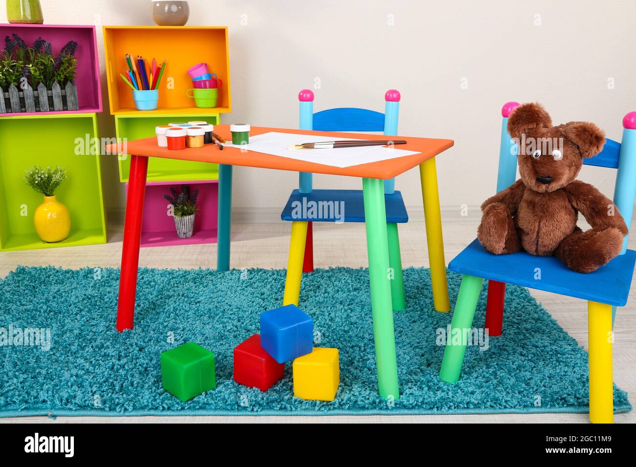 Small and colorful table and chairs for little kids Stock Photo - Alamy