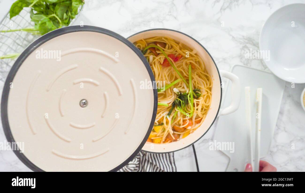 Flat lay. Step by step. Cooking on pot pasta recipe in an enameled cast ...