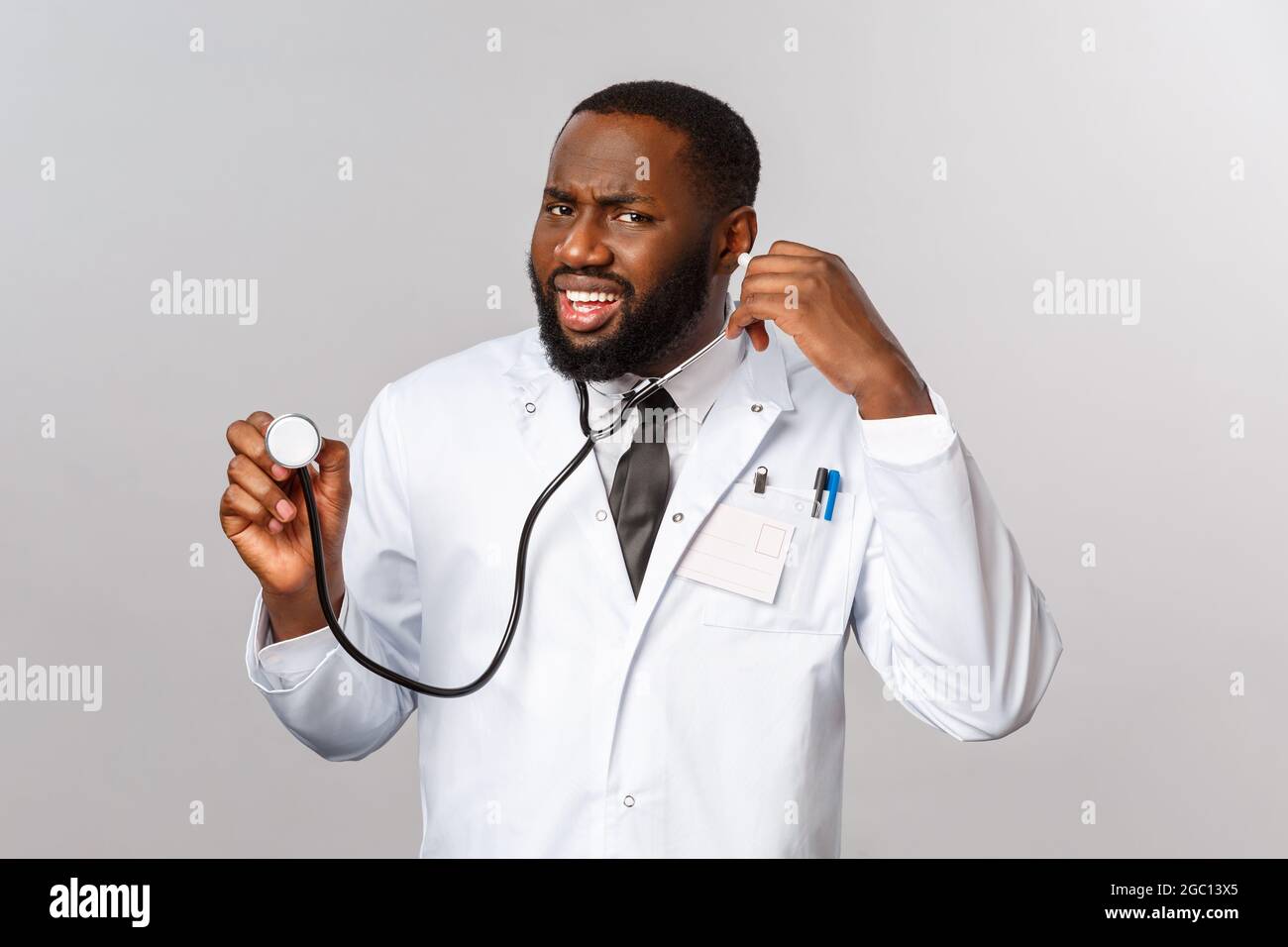 Covid19, hospital check-up and healthcare concept. Portrait of confused ...