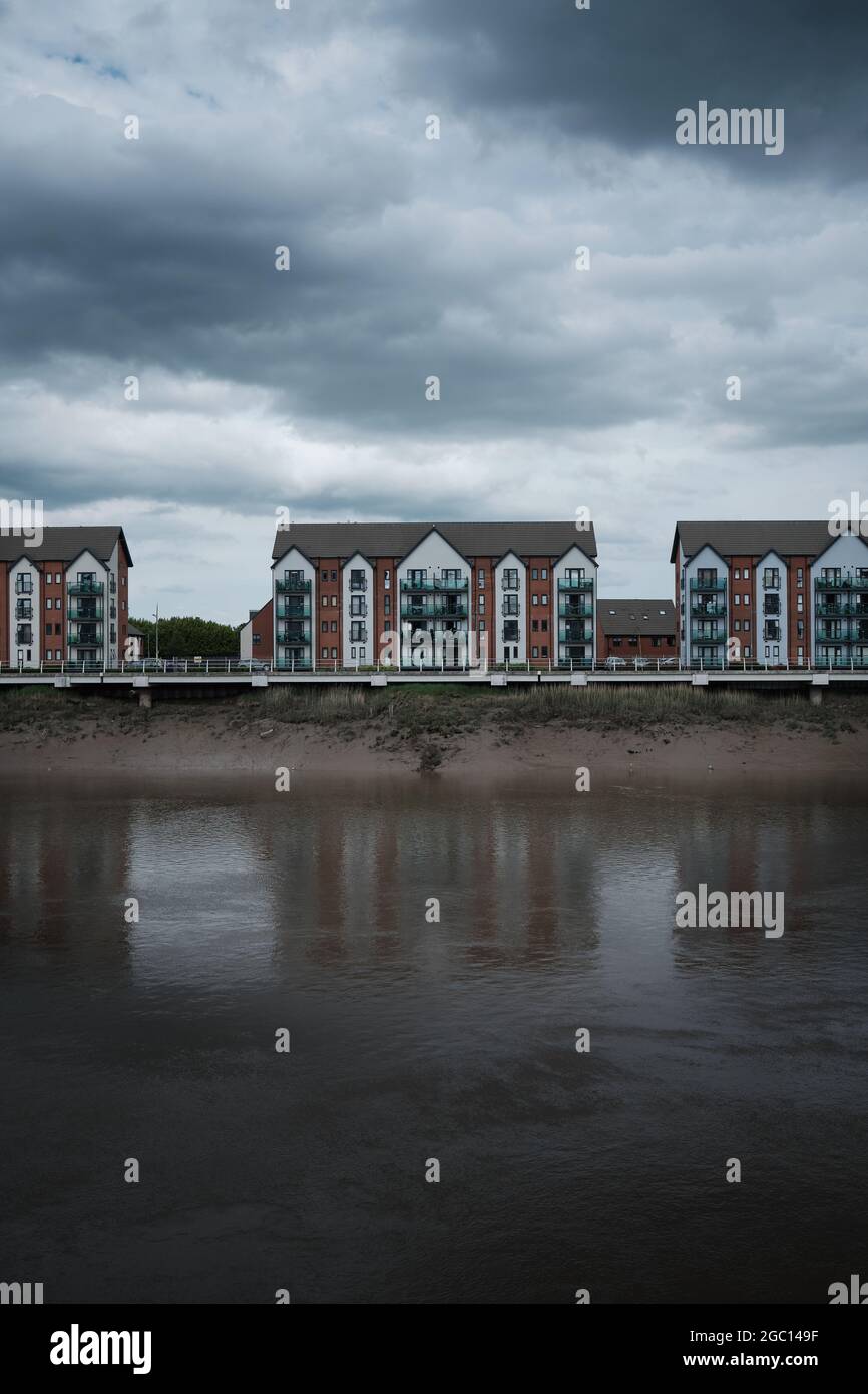 modern housing development on a river bank Stock Photo - Alamy