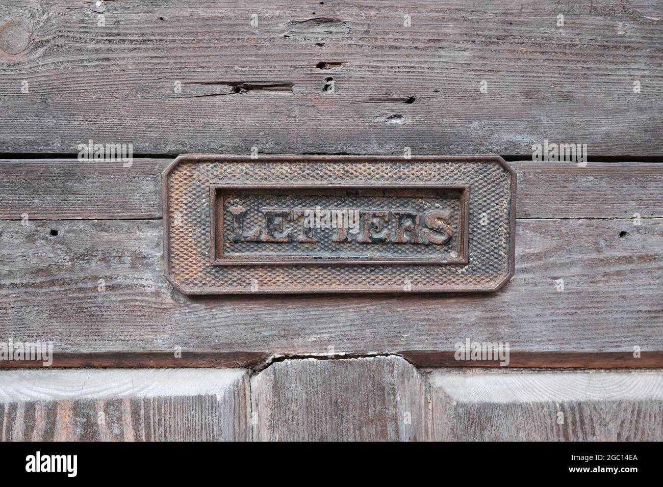 letter box in an old textures wooden door Stock Photo - Alamy
