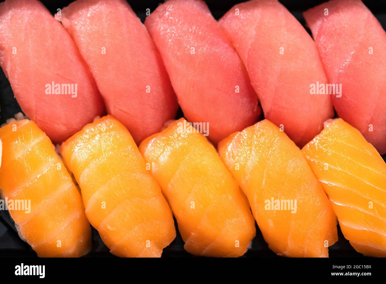 Pre-packaged sushi in a plastic tray Stock Photo - Alamy