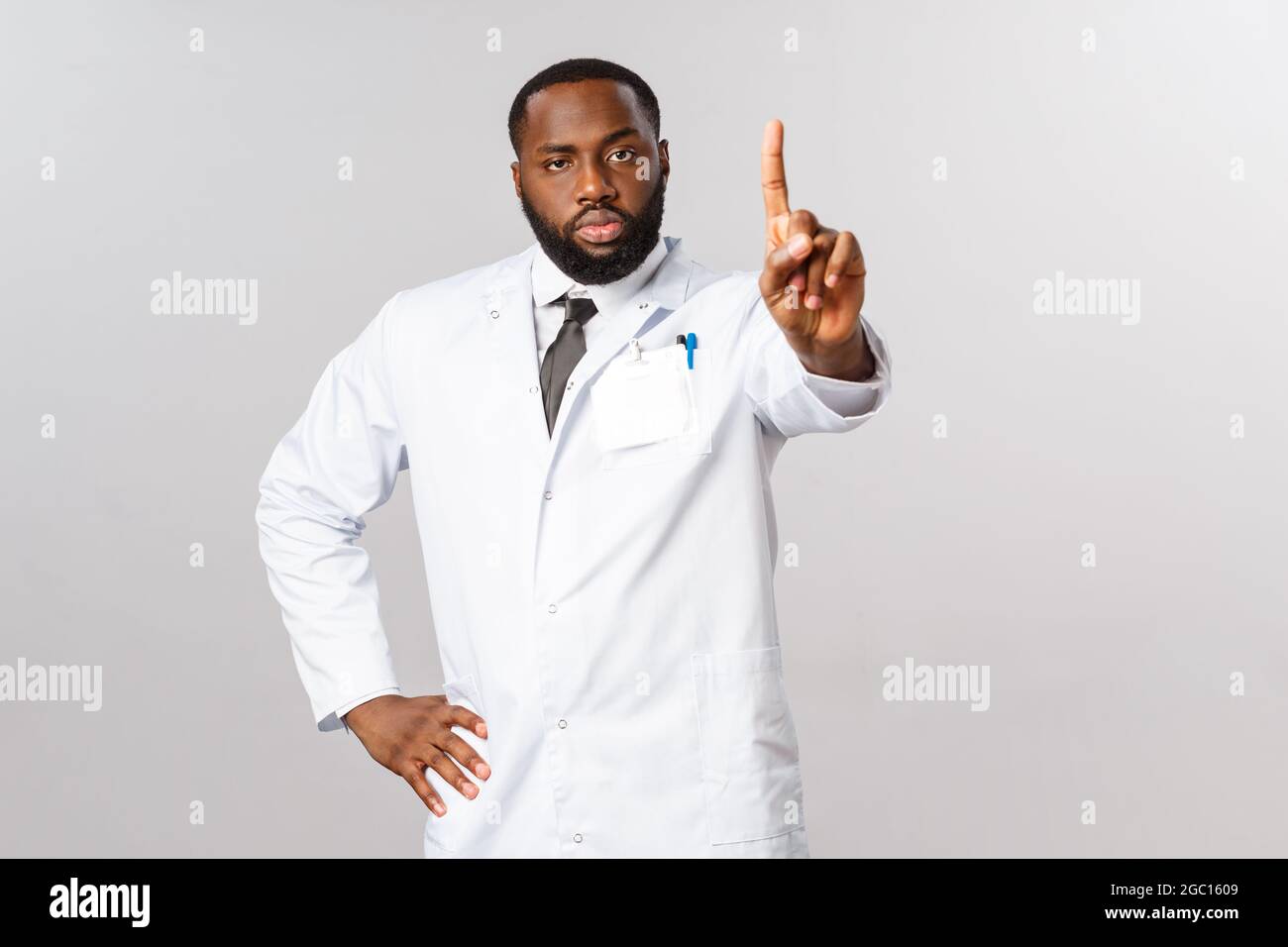 Doctor shaking finger warning bad hi-res stock photography and images ...