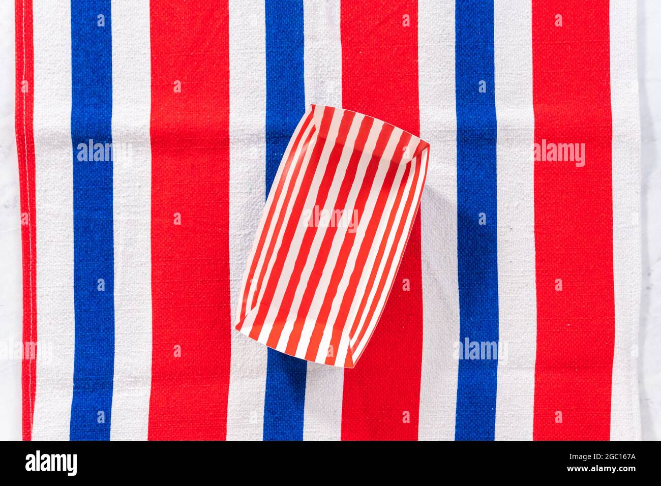 Flat lay. Empty white and red paper bowl for July 4th Stock Photo - Alamy