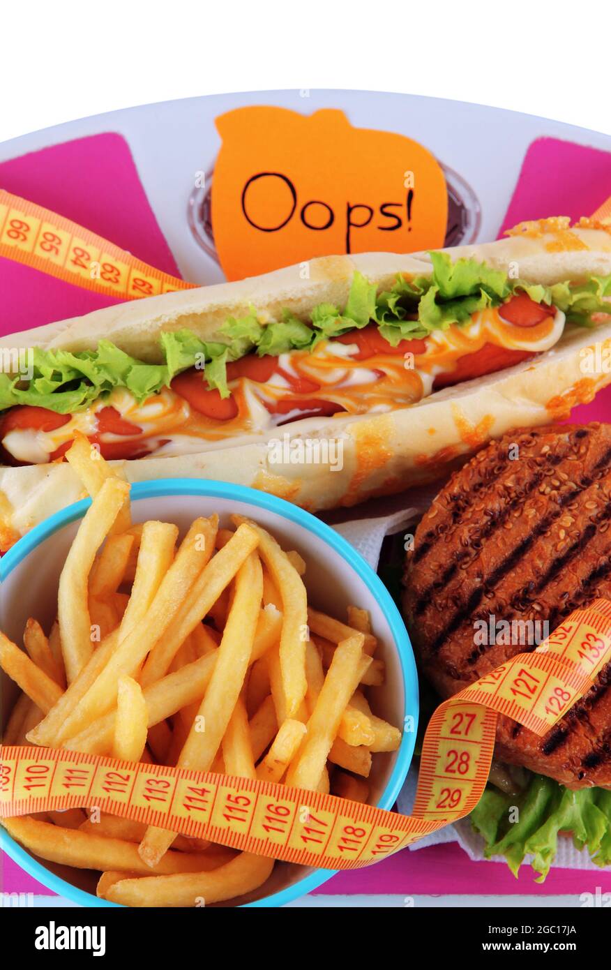 Hot-dog, hamburger and fries on scales isolated on white Stock Photo ...