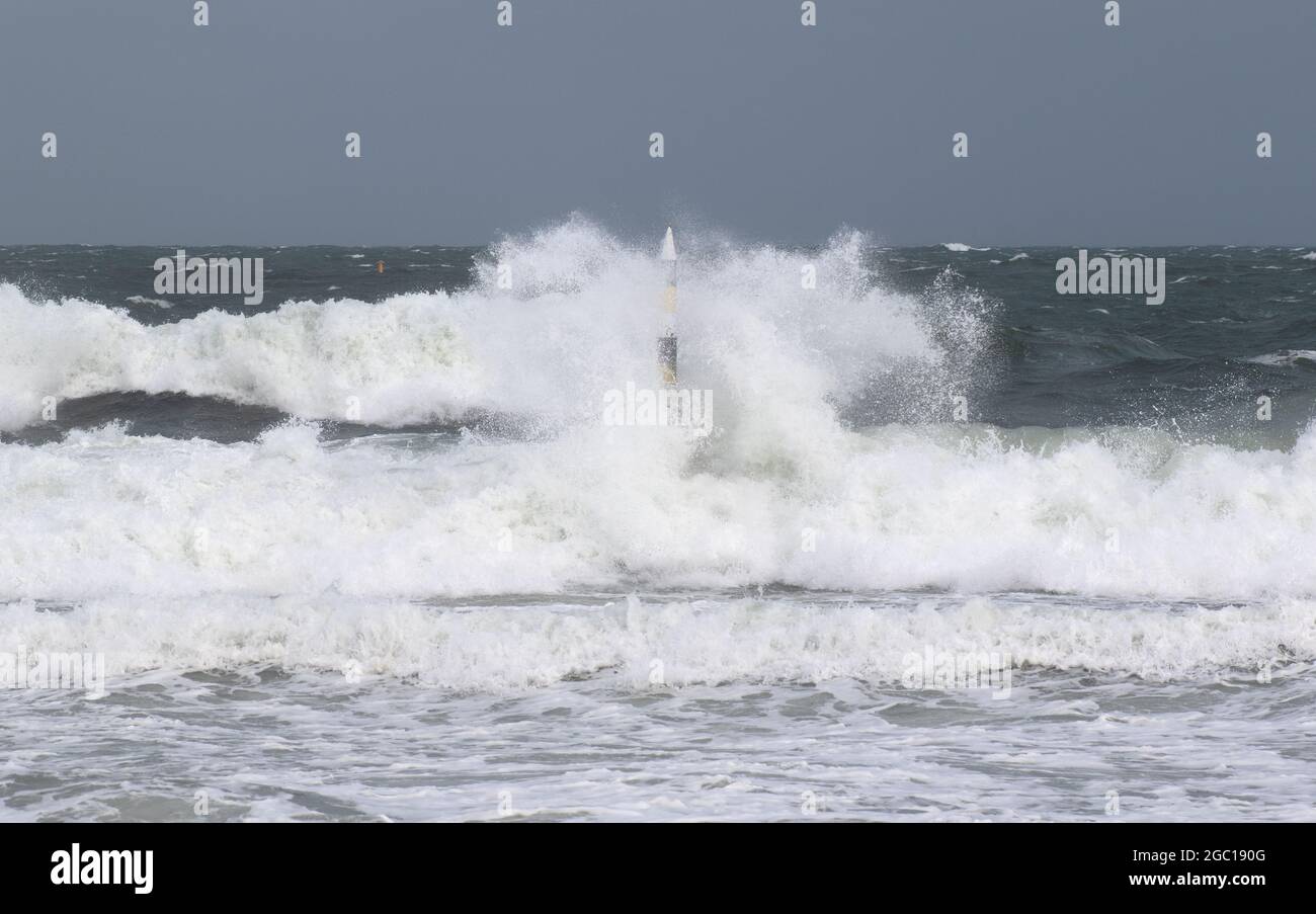 Gale force wind driven waves crash over pylon Stock Photo - Alamy
