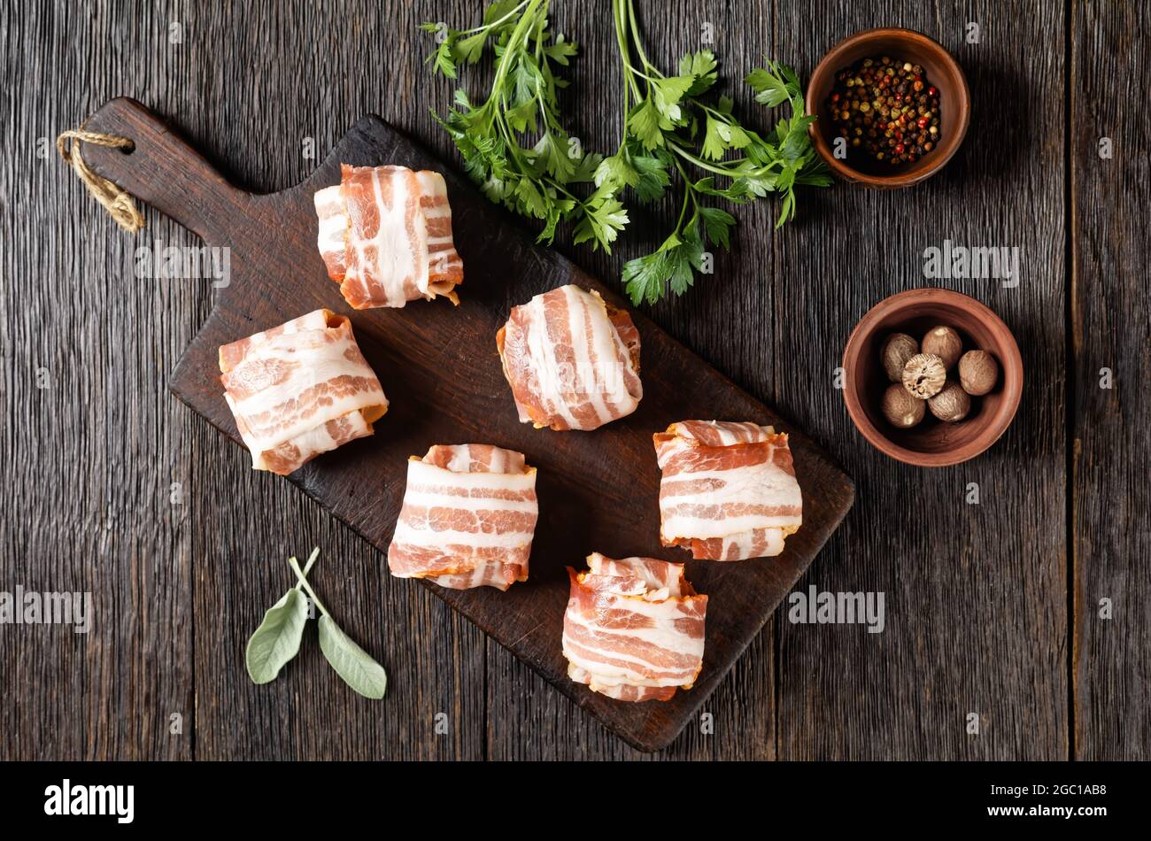 raw english meatballs, uncooked faggots are made of minced offal and ...