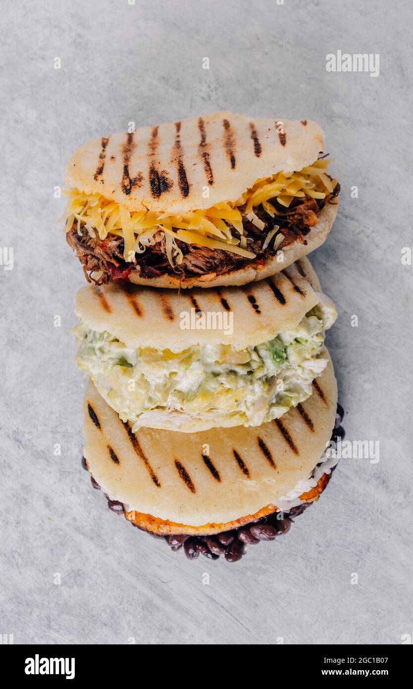 Top view of arepas, breakfast in Colombia and Venezuela, made with corn ...