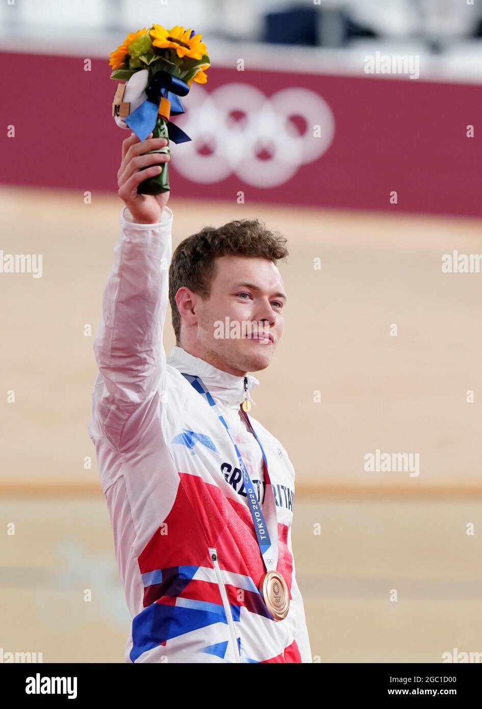 Great Britain's Jack Carlin celebrates on the podium with the bronze ...
