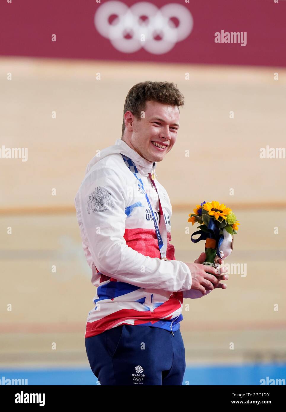 Great Britain's Jack Carlin celebrates on the podium with the bronze ...