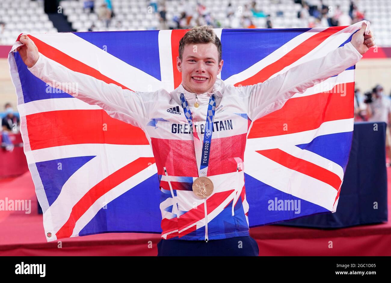 Great Britain's Jack Carlin celebrates on the podium with the bronze ...