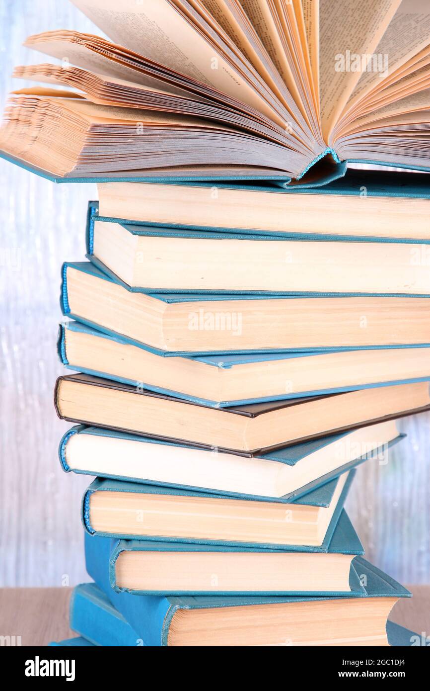 Spiral books on bright background Stock Photo - Alamy